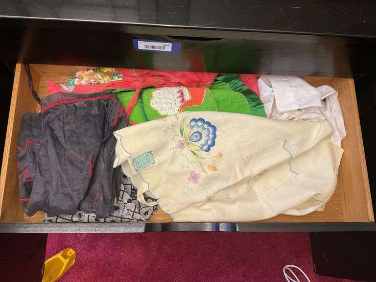 Contents of drawer: fancy aprons - Hurley Real Estate & Auctions