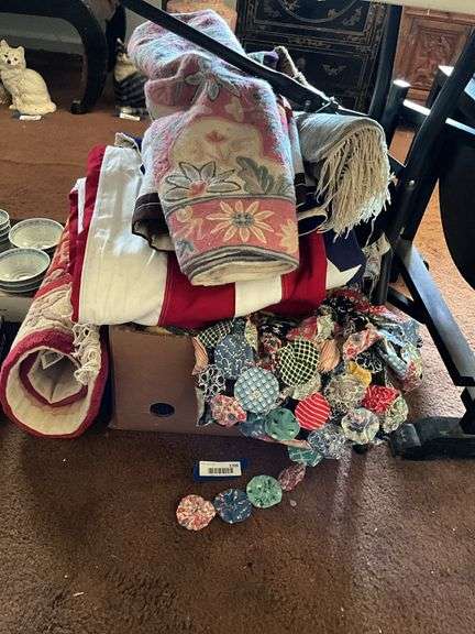 Rolled rugs, American flag, yo-yo needlework, tapestry tablecover ...