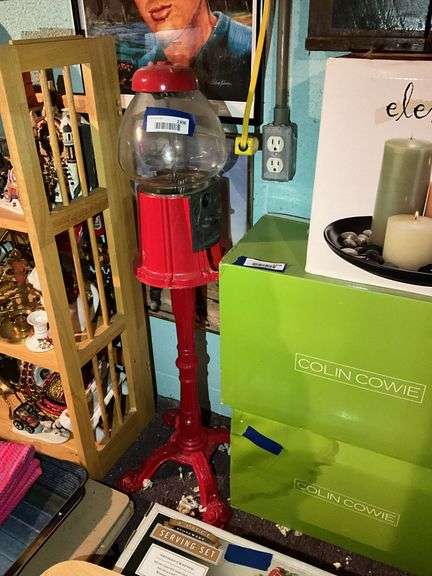 Red gumball machine on floor stand - Hurley Real Estate & Auctions