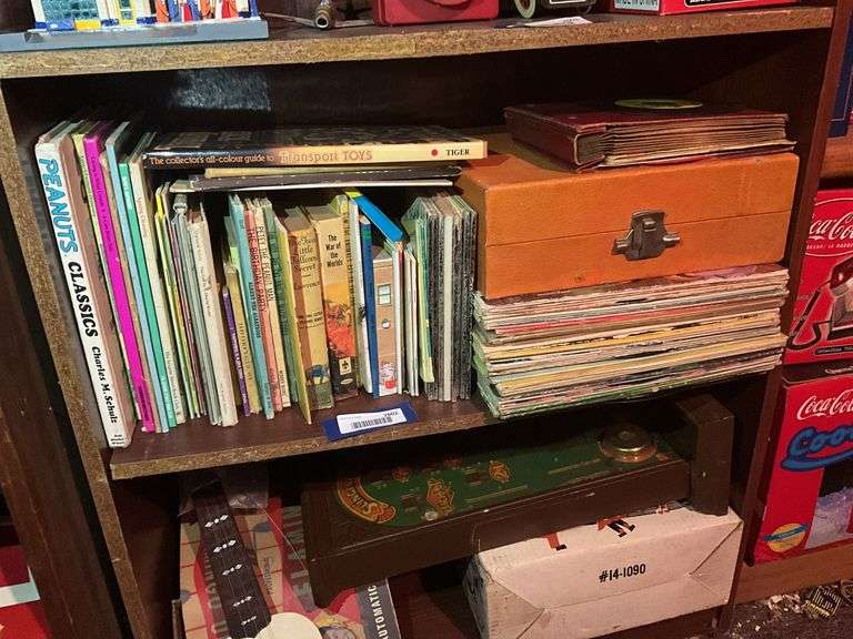 Contents of shelf: vintage vinyl children's records, record player ...