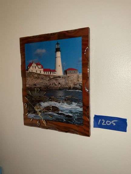 Wall hangings: landscape painting, lighthouse clock and plaques, Harry ...