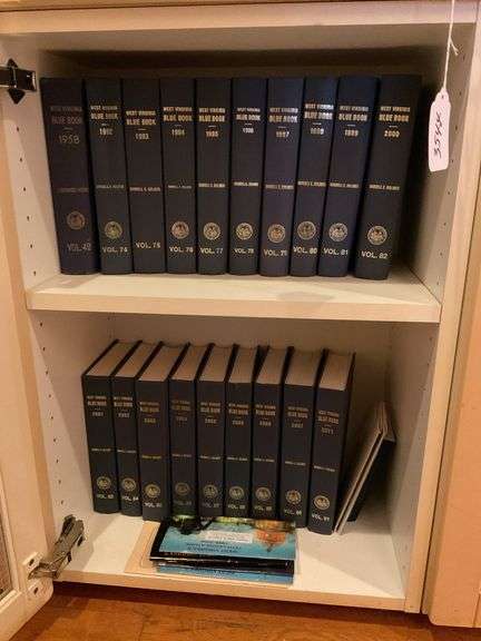 Contents of cupboard: West Virginia Blue Books: 1958. 1990's, 2000's ...
