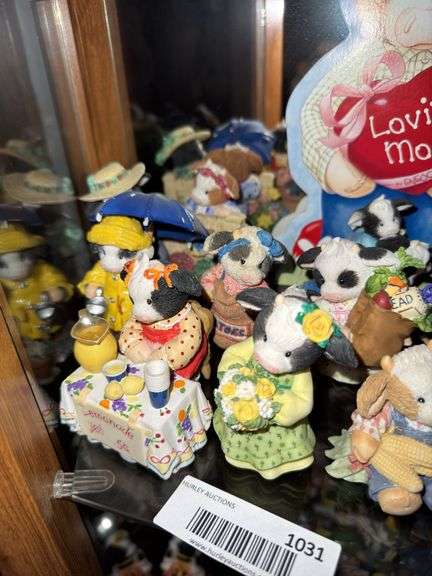 Shelf of Mary Moo Moos - Hurley Real Estate & Auctions