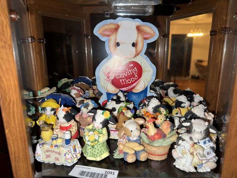 Shelf of Mary Moo Moos - Hurley Real Estate & Auctions