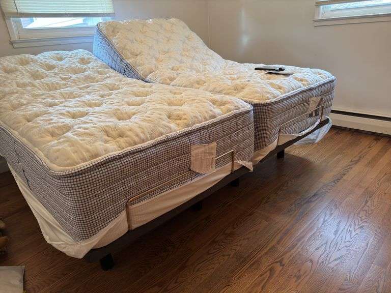 (2) single lift beds with (2) single aireloom mattresses; combined it ...