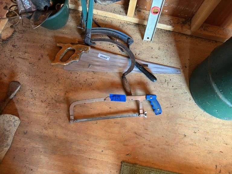 Tool lot to include saws, snips, pry bar, digging iron, and more ...