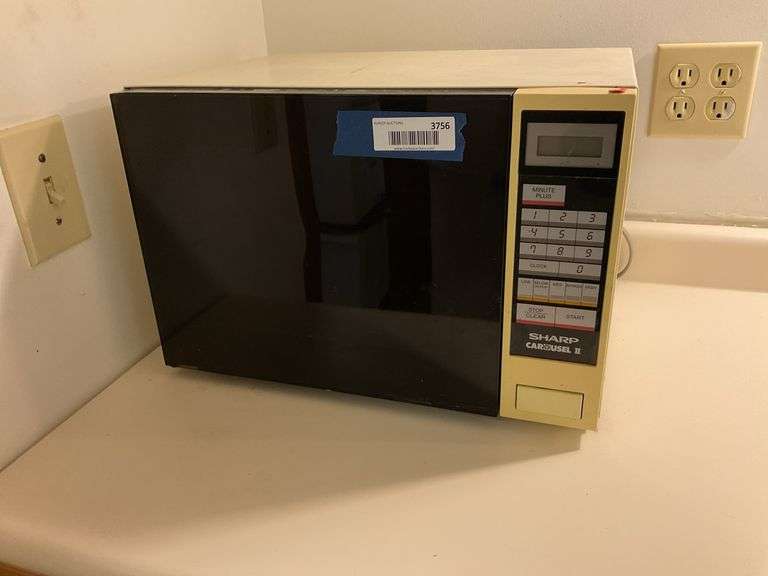 Sharp Carousel II microwave - Hurley Real Estate & Auctions