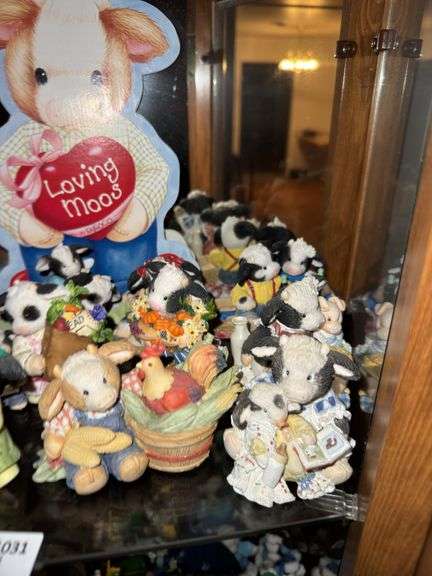 Shelf of Mary Moo Moos - Hurley Real Estate & Auctions