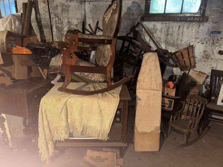 The largest of the basement discovery lights. Lots of antique furniture ...