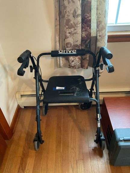 Drive roller style walker w/ hand brakes - Hurley Real Estate & Auctions