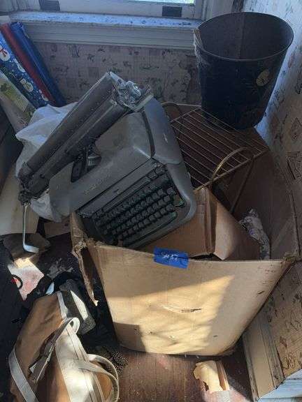 Remaining contents of bedroom, discovery lot. Old typewriter, wrapping ...