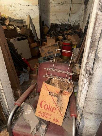 Basement discovery light. Contents of storage room to include old ...