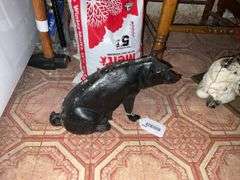 Cast iron seated pig - Hurley Real Estate & Auctions