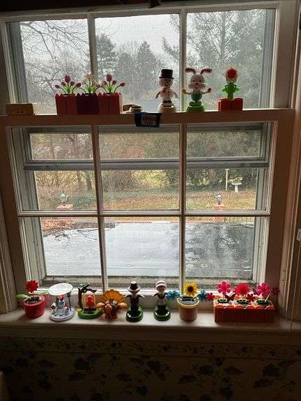 Solar dancers at window - Hurley Real Estate & Auctions