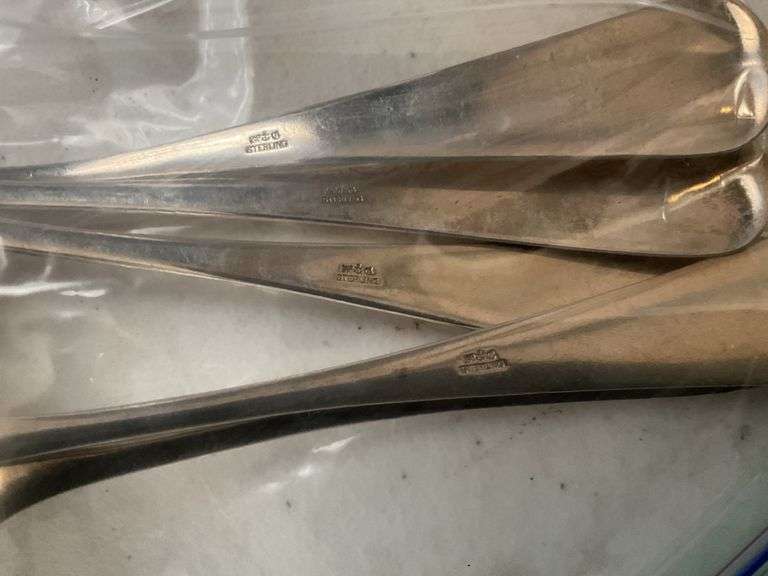 Five bright-cut sterling silver spoons - Hurley Real Estate & Auctions