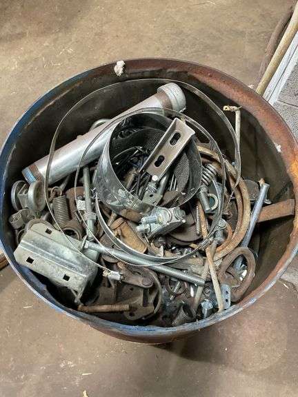 Barrel, full of miscellaneous hardware, scrap metal, parts and pieces ...