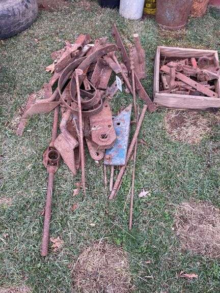 Assortment of scrap metal including old tractor parts and pieces, four ...