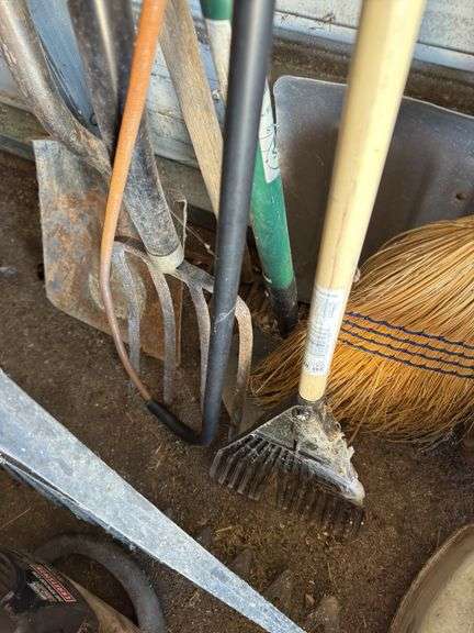 Lawn and garden tools, including flat shovel, garden and leaf rakes ...