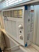 GE window AC unit - Hurley Real Estate & Auctions
