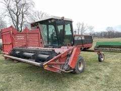 HESSTON 8200 self-propelled Haybine. 12 foot head, 2968 hours. Starts ...