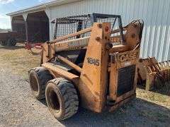 Case 1845 Skid steer with four attachments, including heavy duty pallet ...