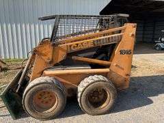 Case 1845 Skid steer with four attachments, including heavy duty pallet ...