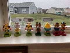 Dancing solar characters - Hurley Real Estate & Auctions