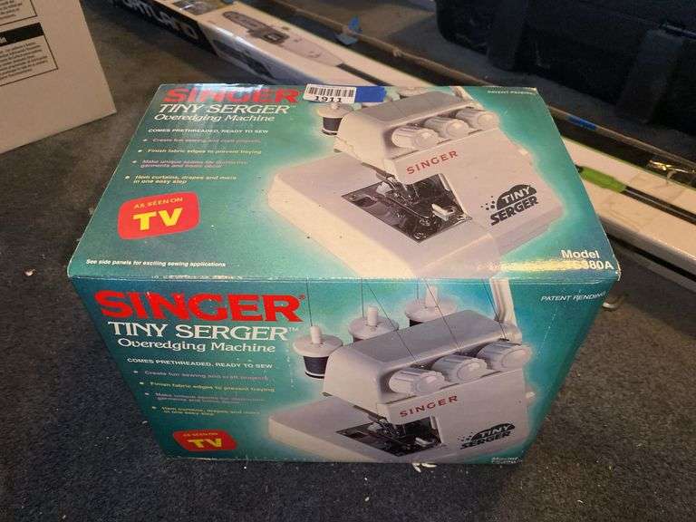 Singer Tiny Serger sewing machine in box - Hurley Real Estate & Auctions