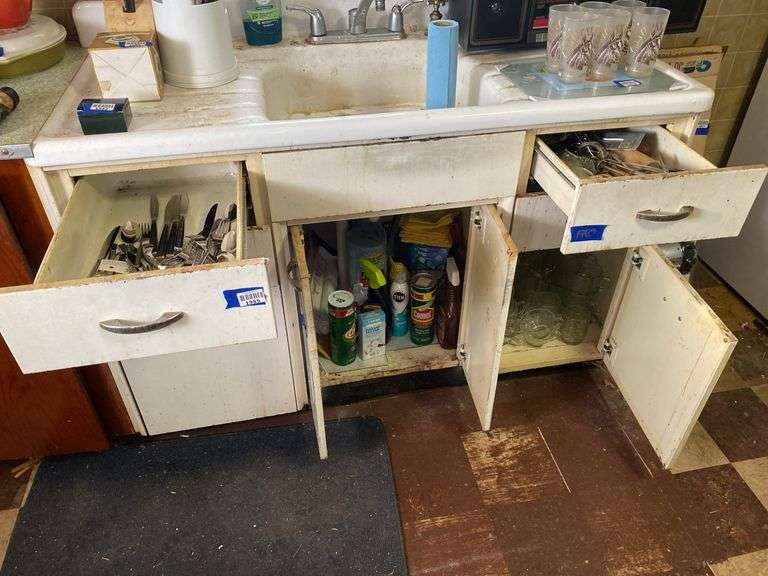 Contents of two drawers and two cupboards: flatware, utensils ...
