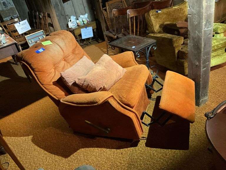 Rust color recliner w/ throw pillows - Hurley Real Estate & Auctions