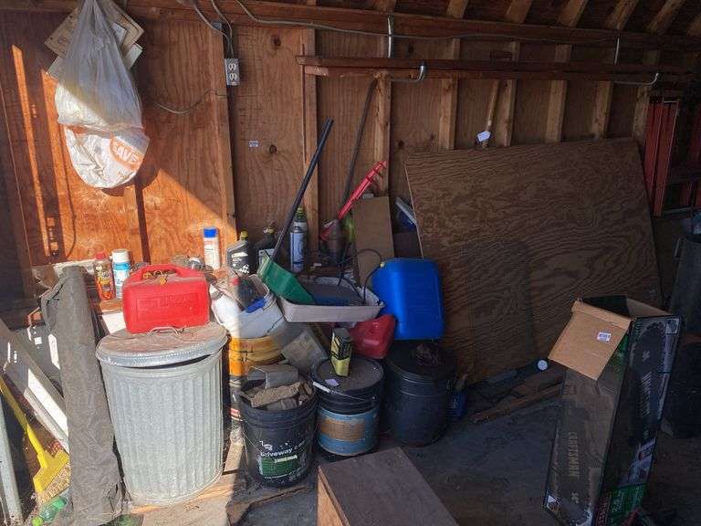 Misc garage lot to include trash can, plywood, fuel cans and more ...
