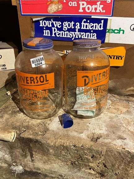 Two Diversol disinfectant advertising jars - Hurley Real Estate & Auctions