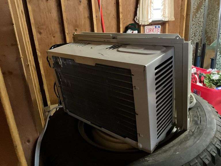 GE window AC unit - Hurley Real Estate & Auctions