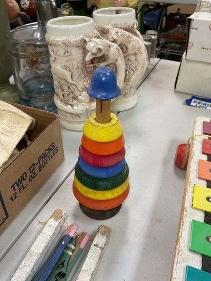 Wooden acrobat toy, Fisher-Price xylophone Pull-a-Tune, stacking rings ...