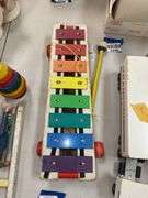 Wooden acrobat toy, Fisher-Price xylophone Pull-a-Tune, stacking rings ...