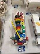 Wooden acrobat toy, Fisher-Price xylophone Pull-a-Tune, stacking rings ...