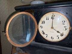 Gilbert black pillar mantel clock - Hurley Real Estate & Auctions
