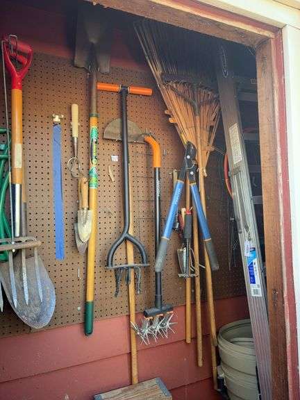 Loppers, leaf rakes, garden tools - hanging on pegboard - Hurley Real ...