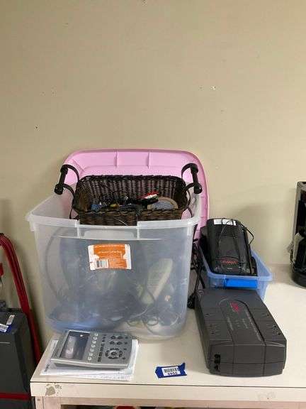 Remotes, surge protector, basket, misc - Hurley Real Estate & Auctions
