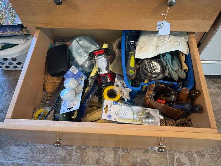 Contents of drawer: tools, tape measure, household items - Hurley Real ...