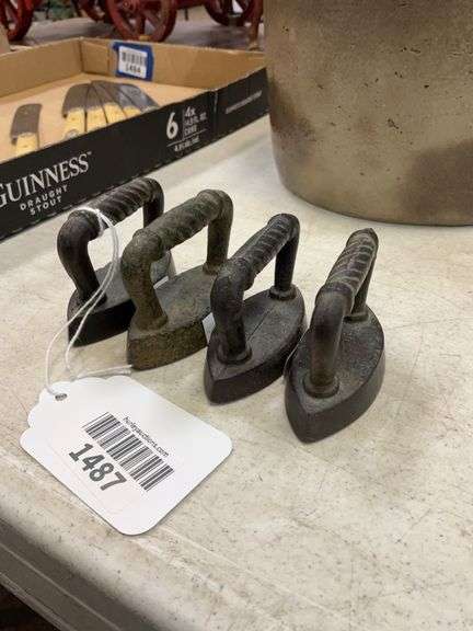 Four small cast sad irons - Hurley Real Estate & Auctions