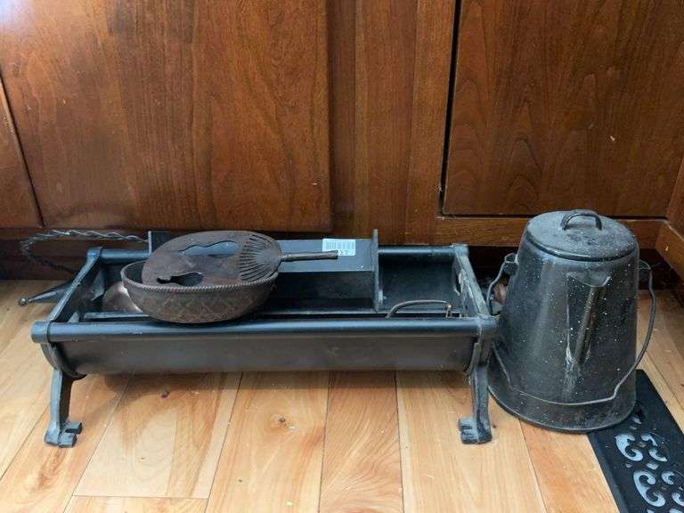 Newspaper log roller, enamel coffee boiler, cast iron incense burner ...
