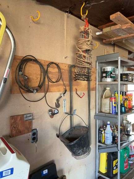 Contents of wall - coal bucket & shovel, two cable hoist assemblies ...