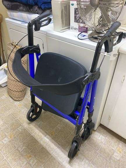 Roller style walker w/ hand brakes - Hurley Real Estate & Auctions