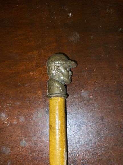 Cast metal jockey head carnival cane - Hurley Real Estate & Auctions