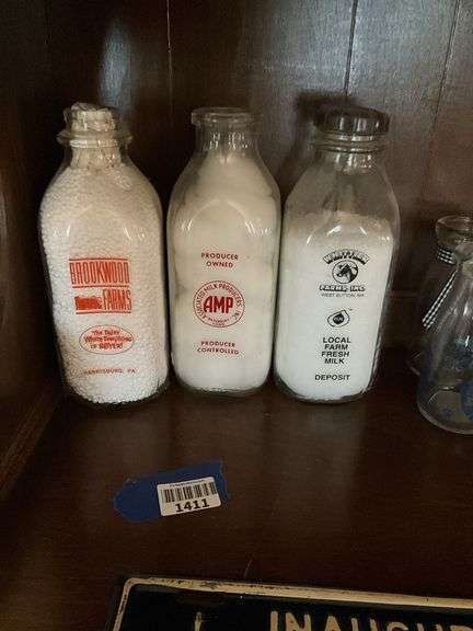 Three milk bottles: Brookwood Farms/ Harrisburg, AMP, Whittier Farms ...