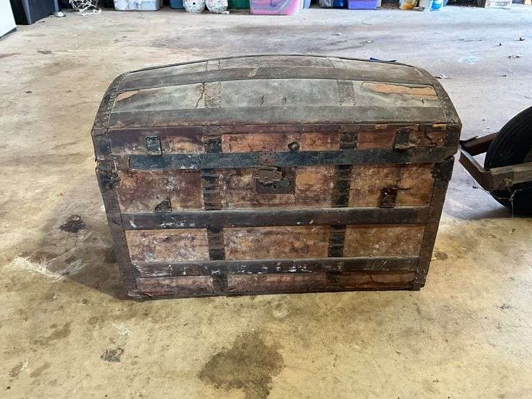 Antique camel back trunk - Hurley Real Estate & Auctions