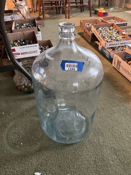 Large glass water bottle - Hurley Real Estate & Auctions