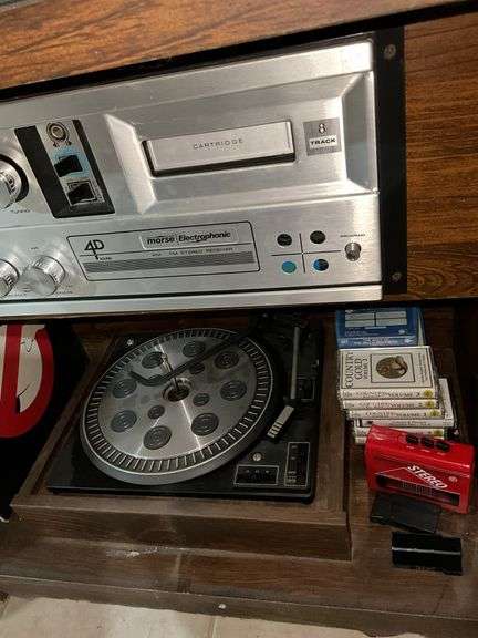 Console stereo turntable/8-track/radio w/ LP records and cassette tapes ...