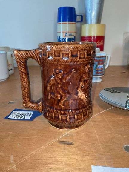 Relief molded stoneware mug w/ dancers - Hurley Real Estate & Auctions